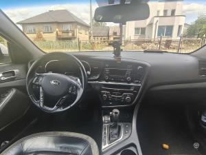 White Kia Optima 2012 in Kursenai, with an engine capacity of 1.70 L and mileage of 277 thousand km for 4300 €, photo 9 on AUTOMOTO.COM.LV