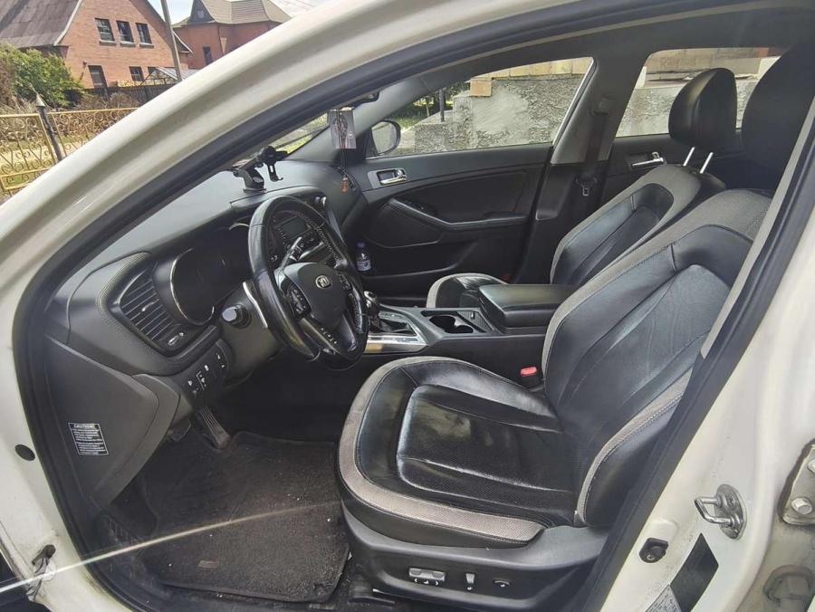 White Kia Optima 2012 in Kursenai, with an engine capacity of 1.70 L and mileage of 277 thousand km for 4300 €, photo 10 on AUTOMOTO.COM.LV