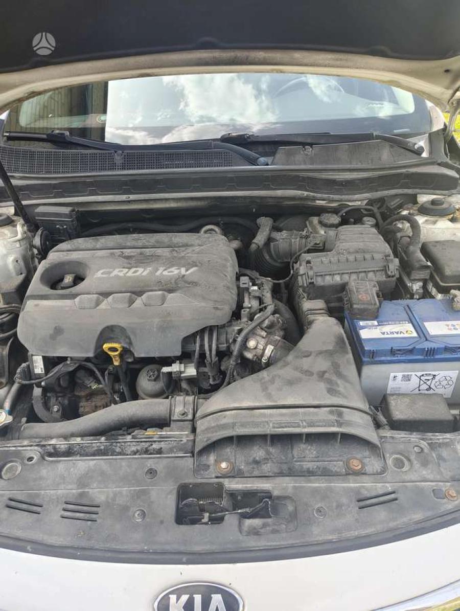 White Kia Optima 2012 in Kursenai, with an engine capacity of 1.70 L and mileage of 277 thousand km for 4300 €, photo 12 on AUTOMOTO.COM.LV