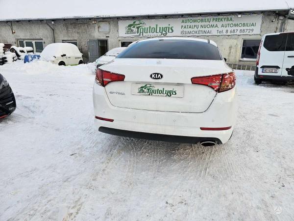 White Kia Optima 2013 in Klaipeda, with an engine capacity of 1.69 L and mileage of 198 thousand km for 4790 €, photo 5 on AUTOMOTO.COM.LV