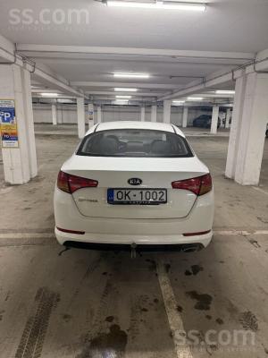 White Kia Optima 2013 in Liepaja, with an engine capacity of 2.00 L and mileage of 229 thousand km for 5900 €, photo 5 on AUTOMOTO.COM.LV