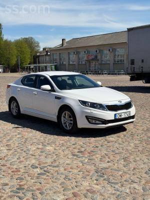 White Kia Optima 2013 in Liepaja, with an engine capacity of 2.00 L and mileage of 232 thousand km for 5700 €, photo  on AUTOMOTO.COM.LV