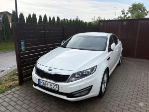 White Kia Optima 2013 in Vilnius, with an engine capacity of 1.69 L and mileage of 222 thousand km for 3100 €, photo  on AUTOMOTO.COM.LV