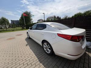White Kia Optima 2013 in Vilnius, with an engine capacity of 1.69 L and mileage of 222 thousand km for 3100 €, photo 13 on AUTOMOTO.COM.LV