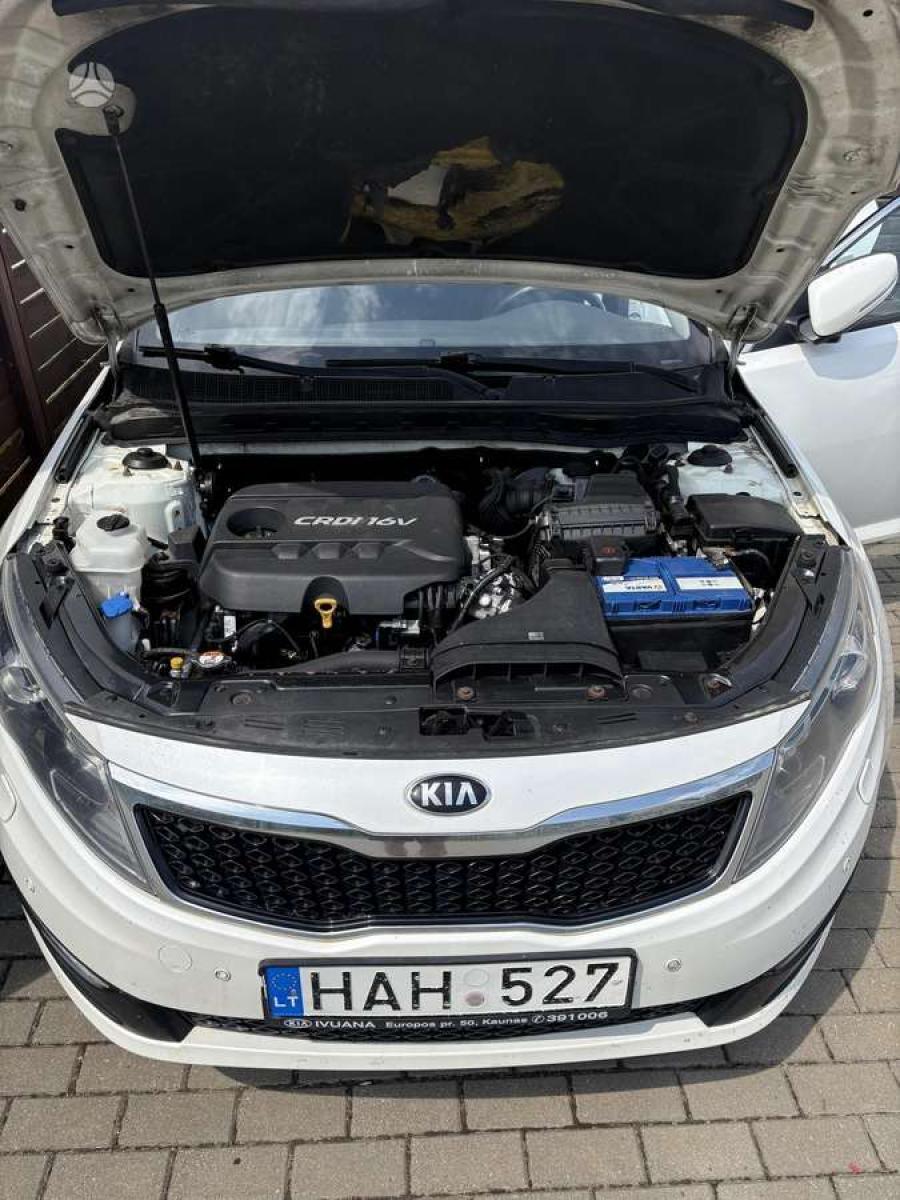 White Kia Optima 2013 in Vilnius, with an engine capacity of 1.69 L and mileage of 222 thousand km for 3100 €, photo 18 on AUTOMOTO.COM.LV