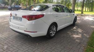 White Kia Optima 2013 in Taurage, with an engine capacity of 1.69 L and mileage of 280 thousand km for 4950 €, photo 3 on AUTOMOTO.COM.LV