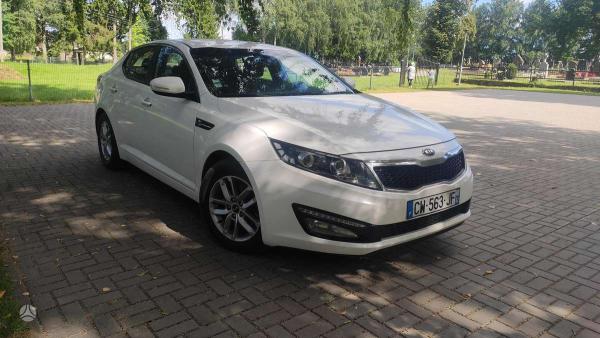 White Kia Optima 2013 in Taurage, with an engine capacity of 1.69 L and mileage of 280 thousand km for 4950 €, photo 3 on AUTOMOTO.COM.LV