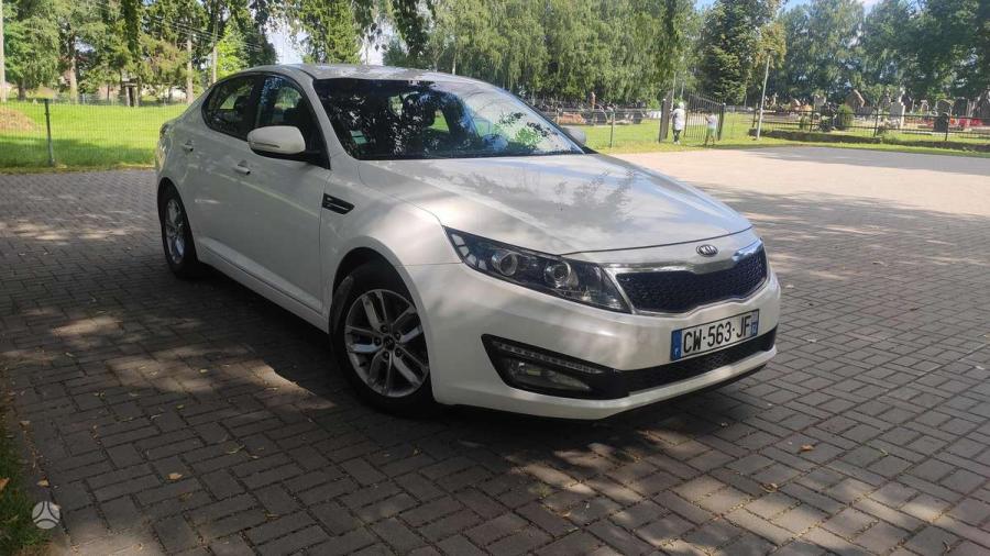 White Kia Optima 2013 in Taurage, with an engine capacity of 1.69 L and mileage of 280 thousand km for 4950 €, photo 4 on AUTOMOTO.COM.LV