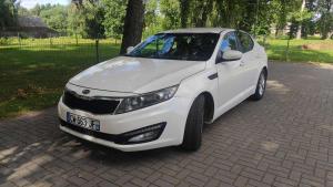 White Kia Optima 2013 in Taurage, with an engine capacity of 1.69 L and mileage of 280 thousand km for 4950 €, photo 6 on AUTOMOTO.COM.LV