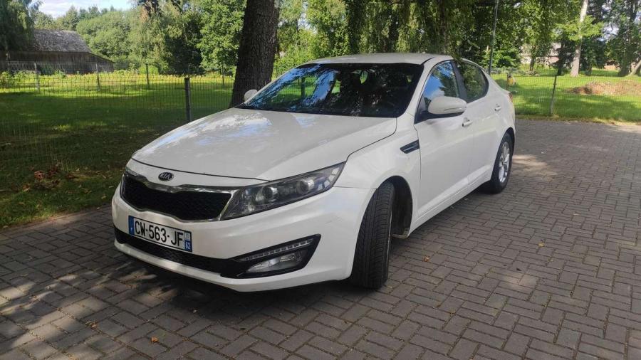 White Kia Optima 2013 in Taurage, with an engine capacity of 1.69 L and mileage of 280 thousand km for 4950 €, photo 6 on AUTOMOTO.COM.LV