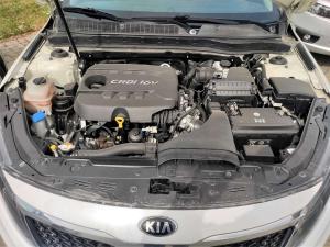 White Kia Optima 2013 in Taurage, with an engine capacity of 1.69 L and mileage of 280 thousand km for 4950 €, photo 14 on AUTOMOTO.COM.LV