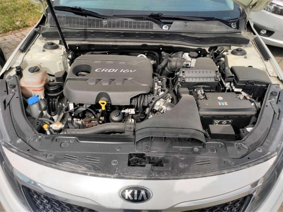 White Kia Optima 2013 in Taurage, with an engine capacity of 1.69 L and mileage of 280 thousand km for 4950 €, photo 14 on AUTOMOTO.COM.LV