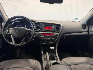 White Kia Optima 2013 in Kaunas, with an engine capacity of 2.00 L and mileage of 193 thousand km for 4900 €, photo 9 on AUTOMOTO.COM.LV