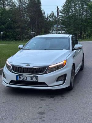 White Kia Optima 2015 in Vilnius, with an engine capacity of 2.36 L and mileage of 260 thousand km for 7900 €, photo 3 on AUTOMOTO.COM.LV