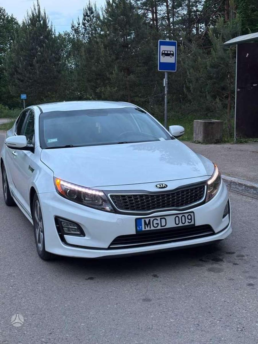White Kia Optima 2015 in Vilnius, with an engine capacity of 2.36 L and mileage of 260 thousand km for 7900 €, photo 6 on AUTOMOTO.COM.LV