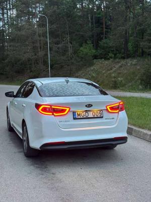 White Kia Optima 2015 in Vilnius, with an engine capacity of 2.36 L and mileage of 260 thousand km for 7900 €, photo 10 on AUTOMOTO.COM.LV