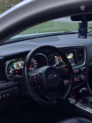 White Kia Optima 2015 in Vilnius, with an engine capacity of 2.36 L and mileage of 260 thousand km for 7900 €, photo 12 on AUTOMOTO.COM.LV