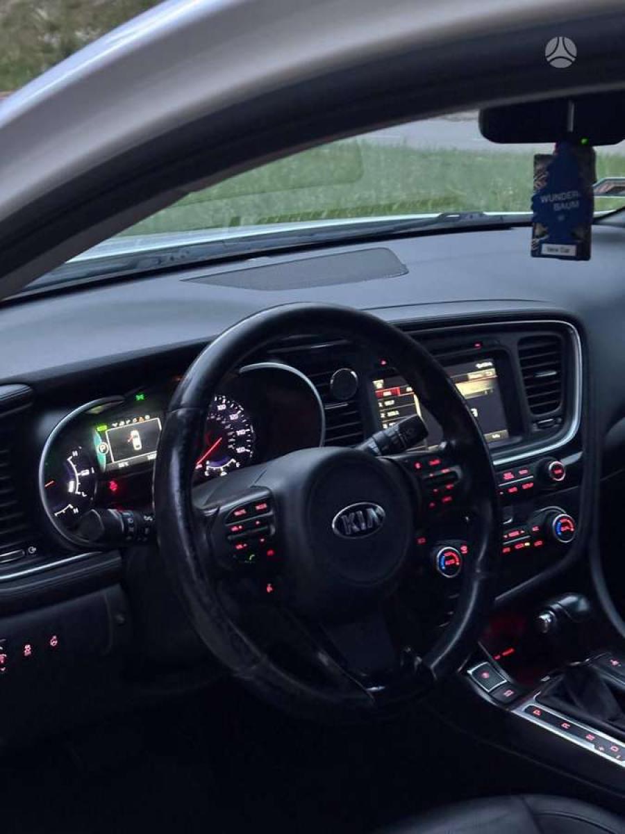 White Kia Optima 2015 in Vilnius, with an engine capacity of 2.36 L and mileage of 260 thousand km for 7900 €, photo 12 on AUTOMOTO.COM.LV