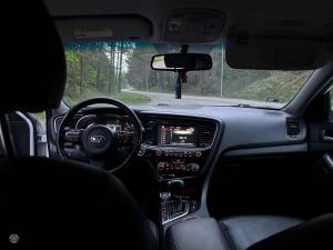 White Kia Optima 2015 in Vilnius, with an engine capacity of 2.36 L and mileage of 260 thousand km for 7900 €, photo 14 on AUTOMOTO.COM.LV