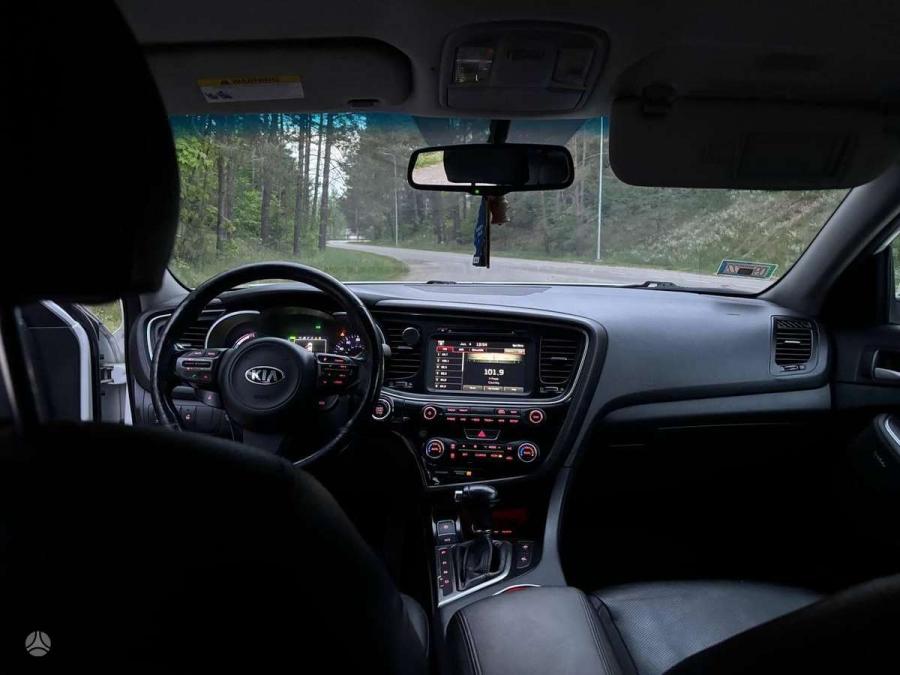 White Kia Optima 2015 in Vilnius, with an engine capacity of 2.36 L and mileage of 260 thousand km for 7900 €, photo 14 on AUTOMOTO.COM.LV