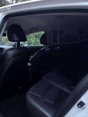 White Kia Optima 2015 in Vilnius, with an engine capacity of 2.36 L and mileage of 260 thousand km for 7900 €, photo 15 on AUTOMOTO.COM.LV