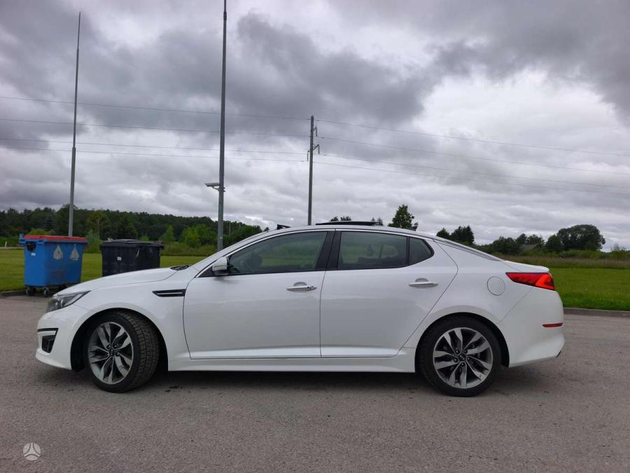 White Kia Optima 2015 in Pakruojis, with an engine capacity of 1.69 L and mileage of 24 thousand km for 6950 €, photo 3 on AUTOMOTO.COM.LV