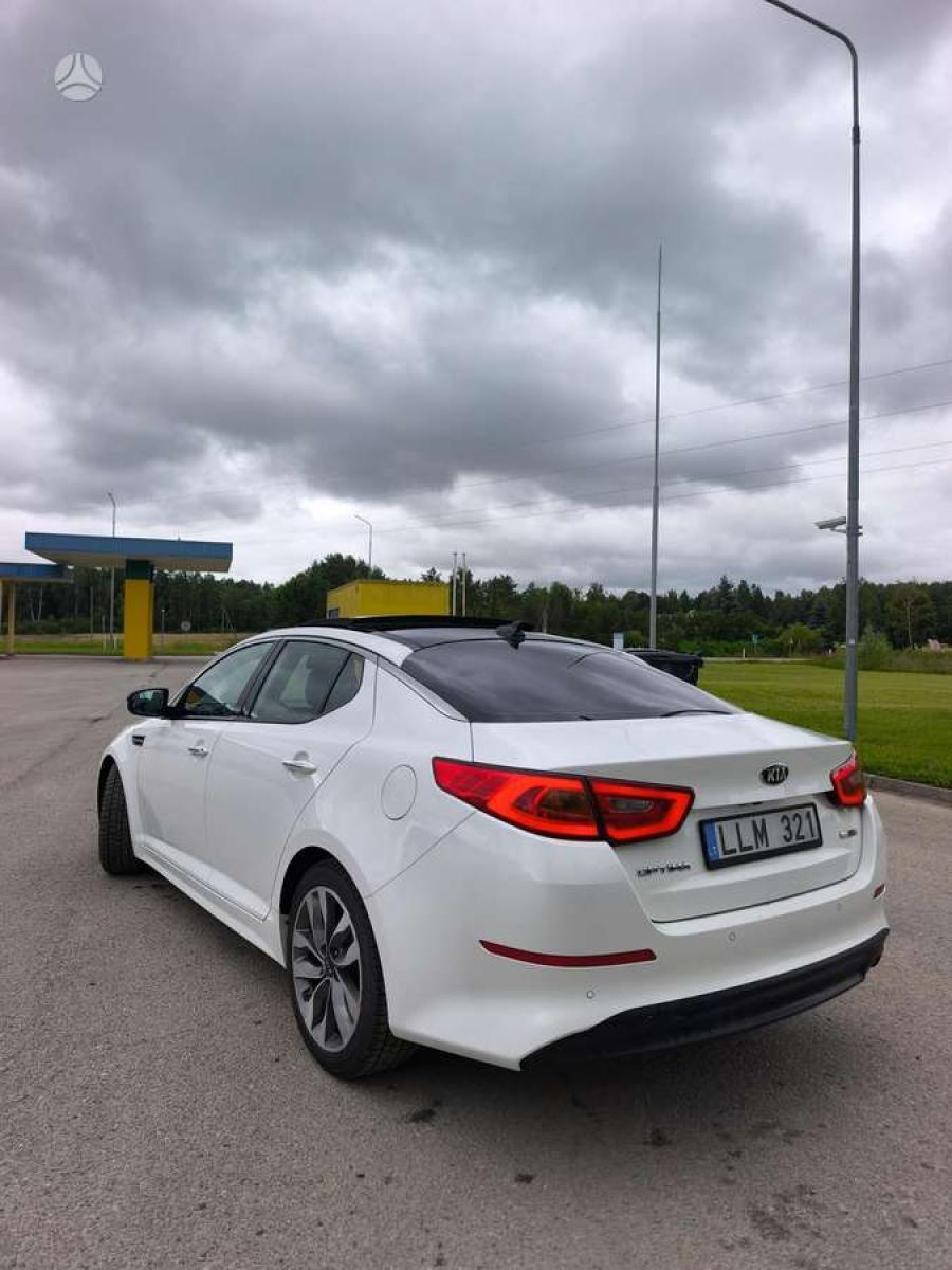 White Kia Optima 2015 in Pakruojis, with an engine capacity of 1.69 L and mileage of 24 thousand km for 6950 €, photo 4 on AUTOMOTO.COM.LV
