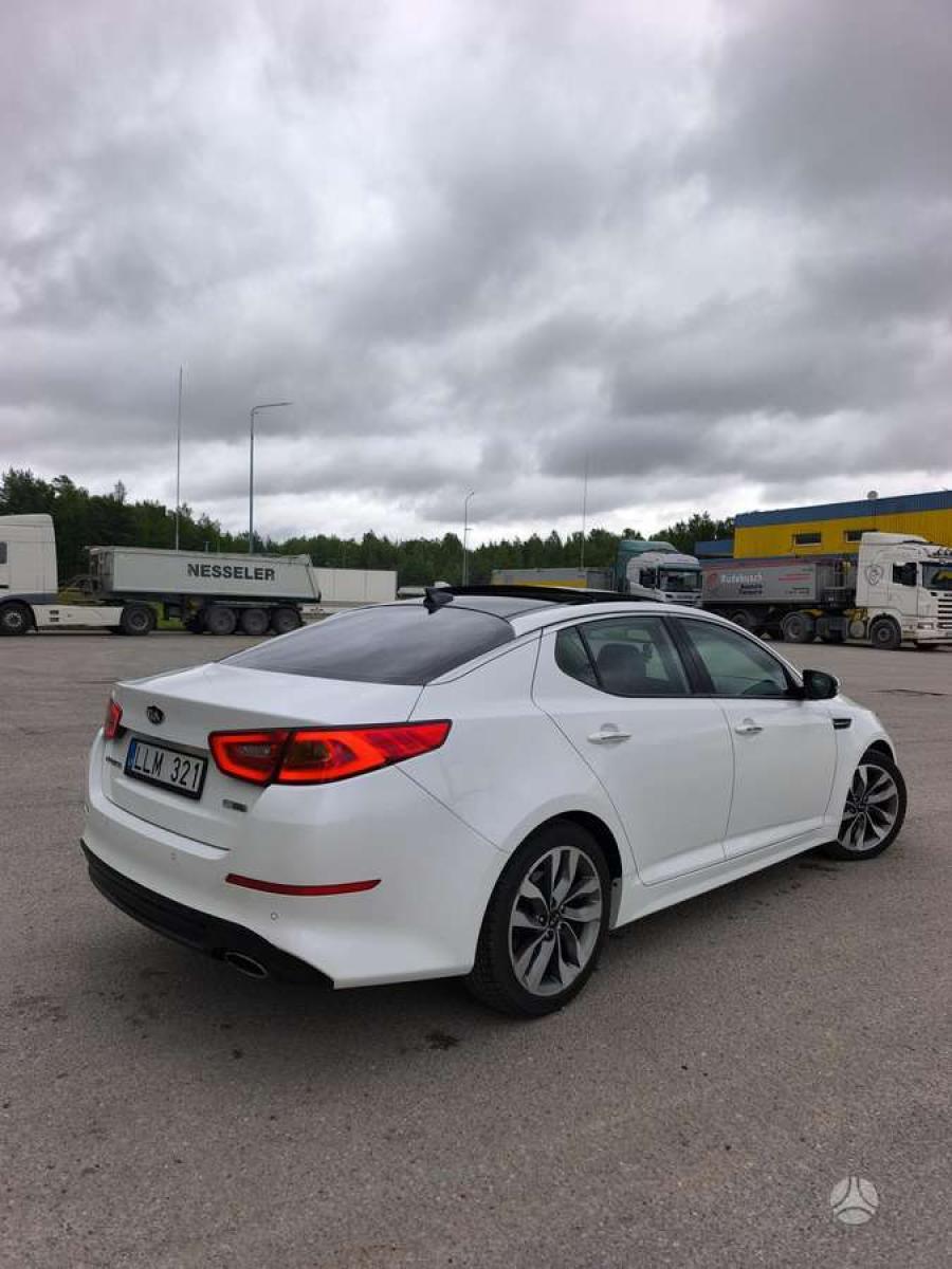 White Kia Optima 2015 in Pakruojis, with an engine capacity of 1.69 L and mileage of 24 thousand km for 6950 €, photo 5 on AUTOMOTO.COM.LV
