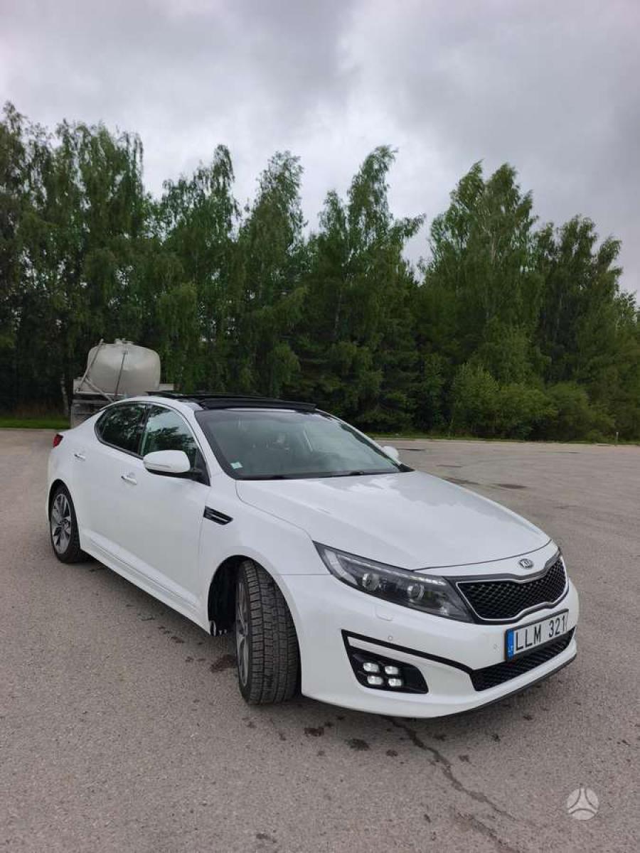 White Kia Optima 2015 in Pakruojis, with an engine capacity of 1.69 L and mileage of 24 thousand km for 6950 €, photo 7 on AUTOMOTO.COM.LV