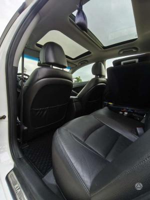 White Kia Optima 2015 in Pakruojis, with an engine capacity of 1.69 L and mileage of 24 thousand km for 6950 €, photo 10 on AUTOMOTO.COM.LV