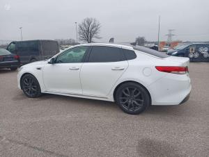 White Kia Optima 2016 in Marijampole, with an engine capacity of 1.70 L and mileage of 222 thousand km for 7990 €, photo 3 on AUTOMOTO.COM.LV