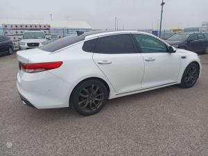 White Kia Optima 2016 in Marijampole, with an engine capacity of 1.70 L and mileage of 222 thousand km for 7990 €, photo 4 on AUTOMOTO.COM.LV