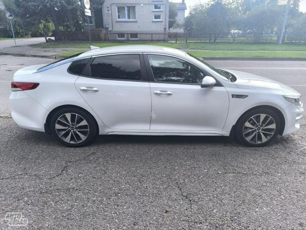 White Kia Optima 2016 in Kaunas, with an engine capacity of 1.70 L and mileage of 216 thousand km for 7500 €, photo 5 on AUTOMOTO.COM.LV