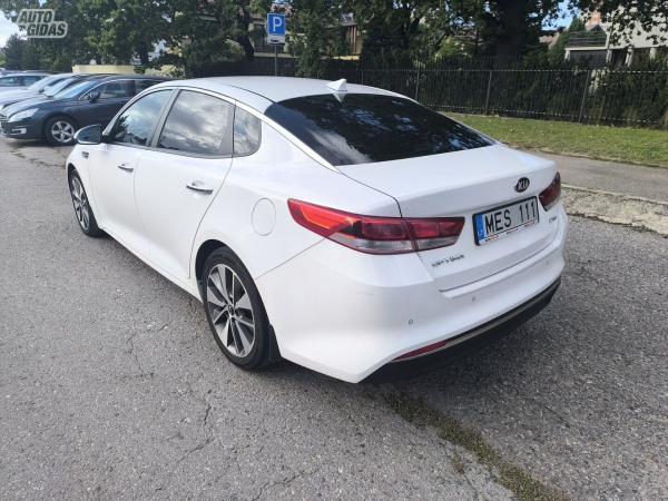 White Kia Optima 2016 in Kaunas, with an engine capacity of 1.70 L and mileage of 216 thousand km for 7500 €, photo 6 on AUTOMOTO.COM.LV