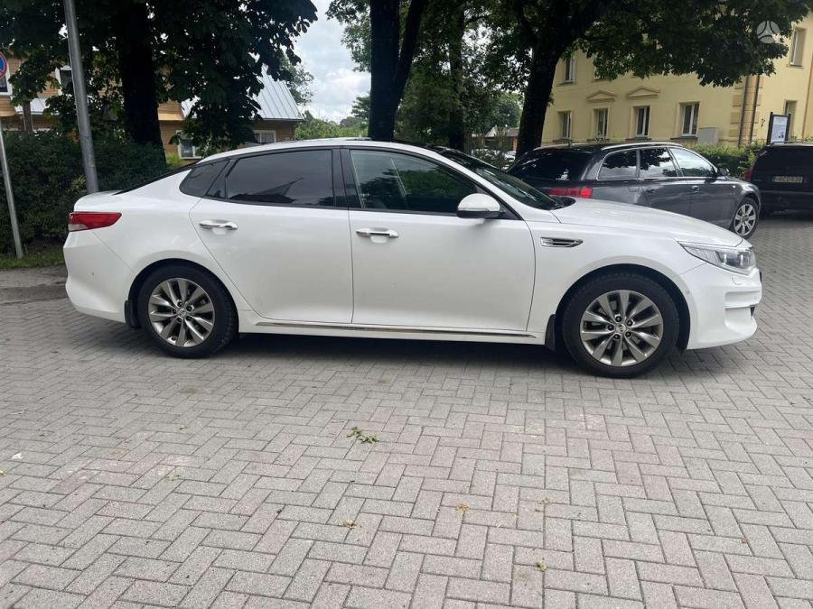 White Kia Optima 2016 in Telschi, with an engine capacity of 1.69 L and mileage of 274 thousand km for 6850 €, photo 5 on AUTOMOTO.COM.LV