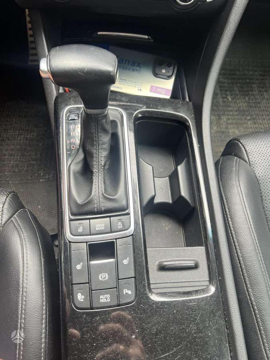 White Kia Optima 2016 in Telschi, with an engine capacity of 1.69 L and mileage of 274 thousand km for 6850 €, photo 13 on AUTOMOTO.COM.LV