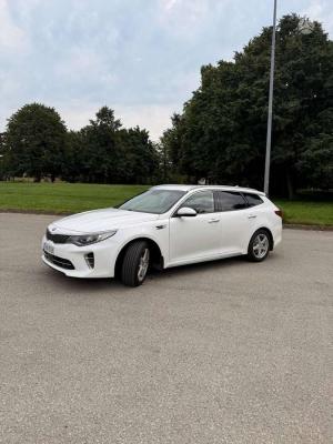 White Kia Optima 2017 in Klaipeda, with an engine capacity of 1.69 L and mileage of 269 thousand km for 5250 €, photo 4 on AUTOMOTO.COM.LV