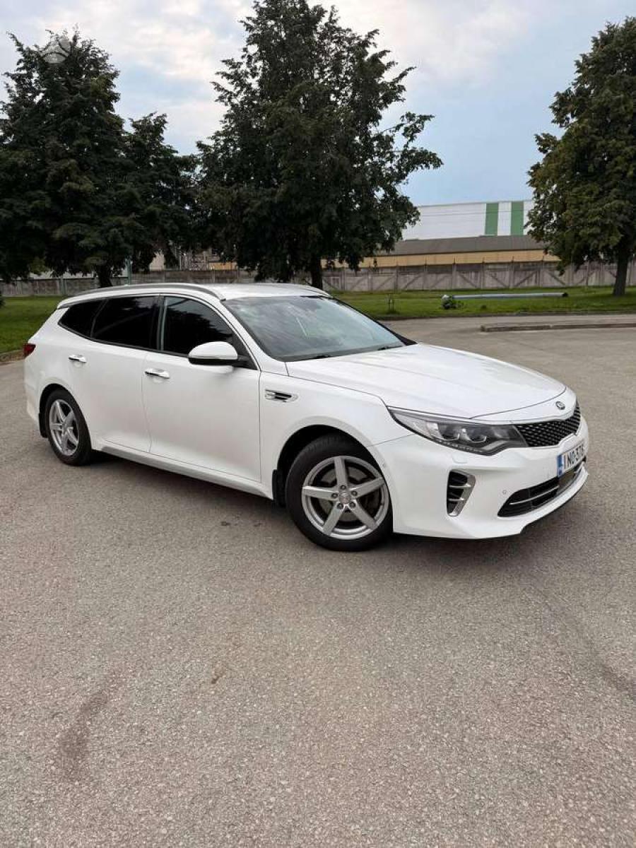White Kia Optima 2017 in Klaipeda, with an engine capacity of 1.69 L and mileage of 269 thousand km for 5250 €, photo 6 on AUTOMOTO.COM.LV