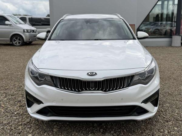 White Kia Optima 2019 in Siauliai, with an engine capacity of 1.60 L and mileage of 259 thousand km for 8200 €, photo 3 on AUTOMOTO.COM.LV