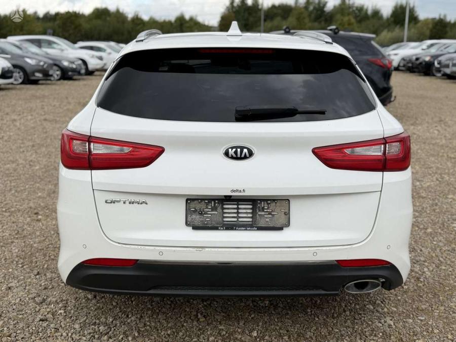 White Kia Optima 2019 in Siauliai, with an engine capacity of 1.60 L and mileage of 259 thousand km for 8200 €, photo 6 on AUTOMOTO.COM.LV
