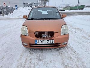 Orange Kia Picanto 2005 in Vilnius, with an engine capacity of 1.09 L and mileage of 72 thousand km for 1300 €, photo 7 on AUTOMOTO.COM.LV