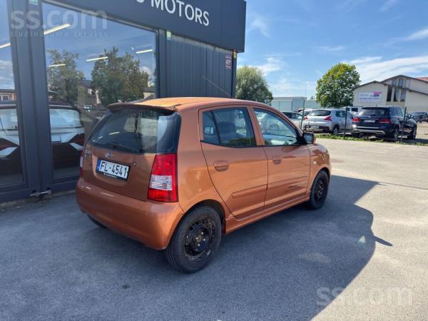 Orange Kia Picanto 2006 in Jelgava, with an engine capacity of 1.00 L and mileage of 135 thousand km for 1900 €, photo 5 on AUTOMOTO.COM.LV