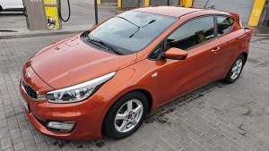 Oranžs Kia ProCeed 2013 Kauņa, ar dzinēja tilpumu 1.40 L un nobraukumu 191 tūkst. km par 4750 €, foto  vietnē AUTOMOTO.COM.LV