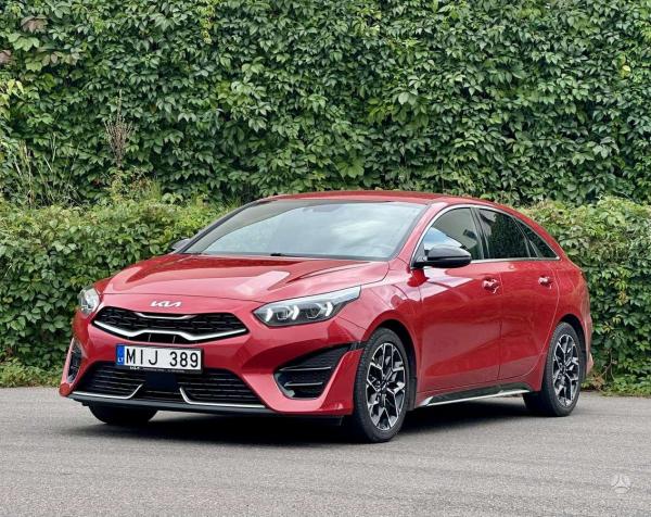 Red Kia ProCeed 2022 in Vilnius, with an engine capacity of 1.50 L and mileage of 124 thousand km for 15500 €, photo 1 on AUTOMOTO.COM.LV