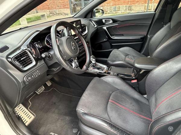 White Kia ProCeed 2019 in Kaunas, with an engine capacity of 1.59 L and mileage of 128 thousand km for 17900 €, photo 5 on AUTOMOTO.COM.LV