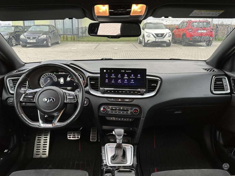White Kia ProCeed 2021 in Klaipeda, with an engine capacity of 1.59 L and mileage of 105 thousand km for 17900 €, photo 13 on AUTOMOTO.COM.LV
