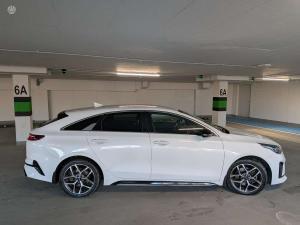 White Kia ProCeed 2021 in Vilnius, with an engine capacity of 1.48 L and mileage of 80 thousand km for 16800 €, photo  on AUTOMOTO.COM.LV