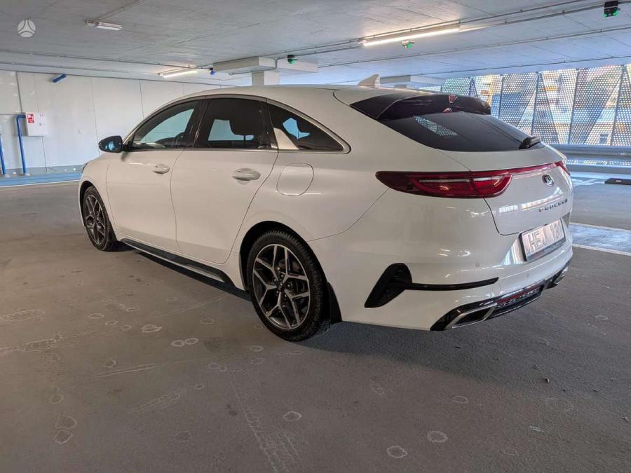 White Kia ProCeed 2021 in Vilnius, with an engine capacity of 1.48 L and mileage of 80 thousand km for 16800 €, photo 6 on AUTOMOTO.COM.LV
