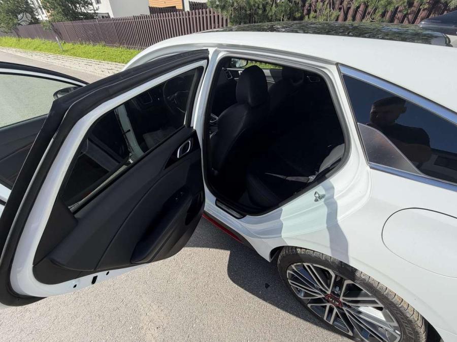 White Kia ProCeed 2021 in Vilnius, with an engine capacity of 1.59 L and mileage of 127 thousand km for 15500 €, photo 12 on AUTOMOTO.COM.LV