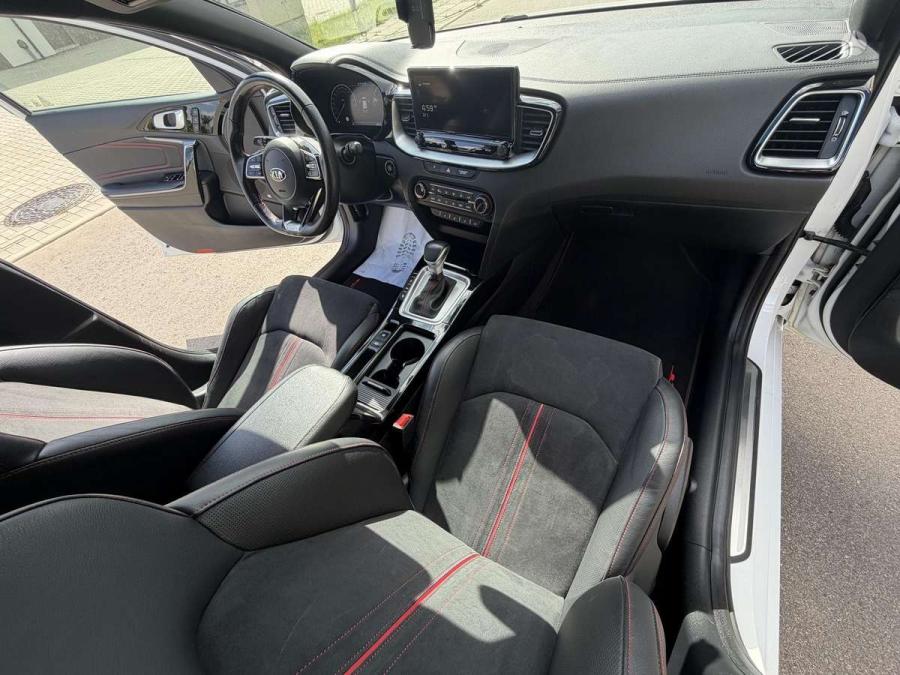White Kia ProCeed 2021 in Vilnius, with an engine capacity of 1.59 L and mileage of 127 thousand km for 15500 €, photo 20 on AUTOMOTO.COM.LV